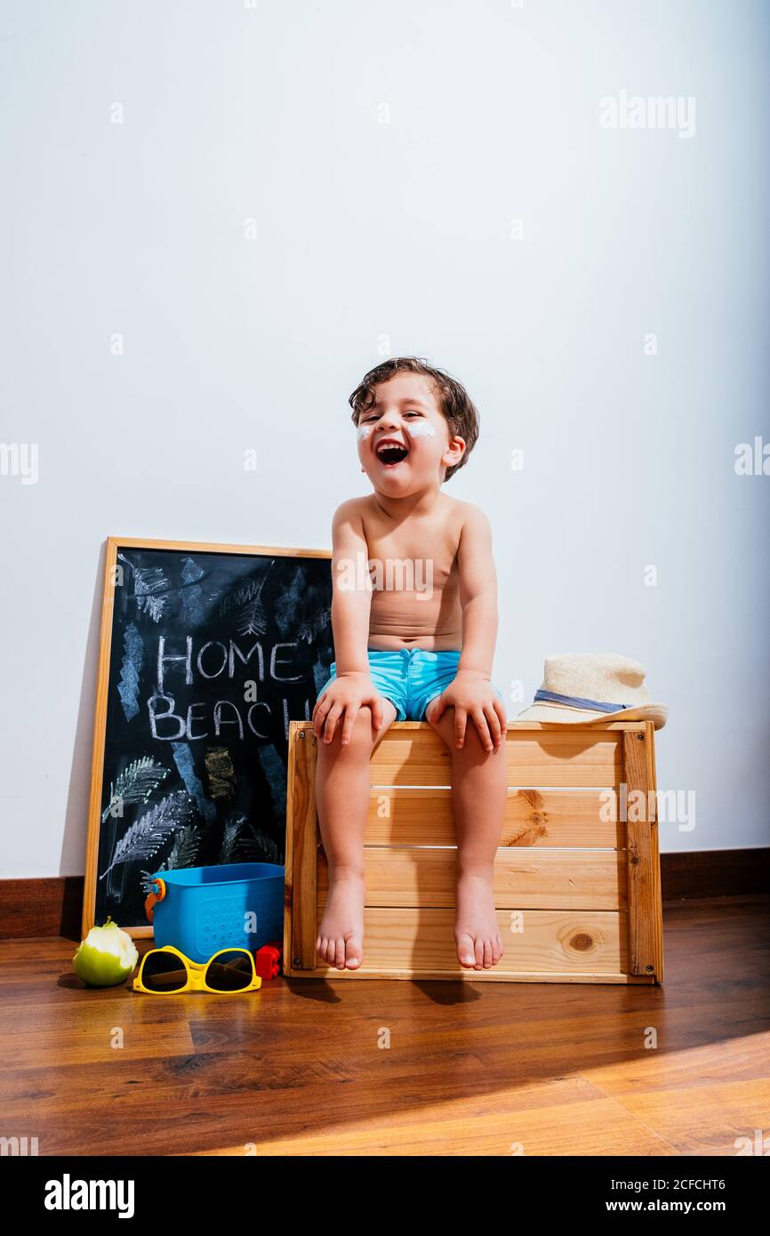 Boy Trunks Sitting High Resolution Stock Photography and Images - Alamy