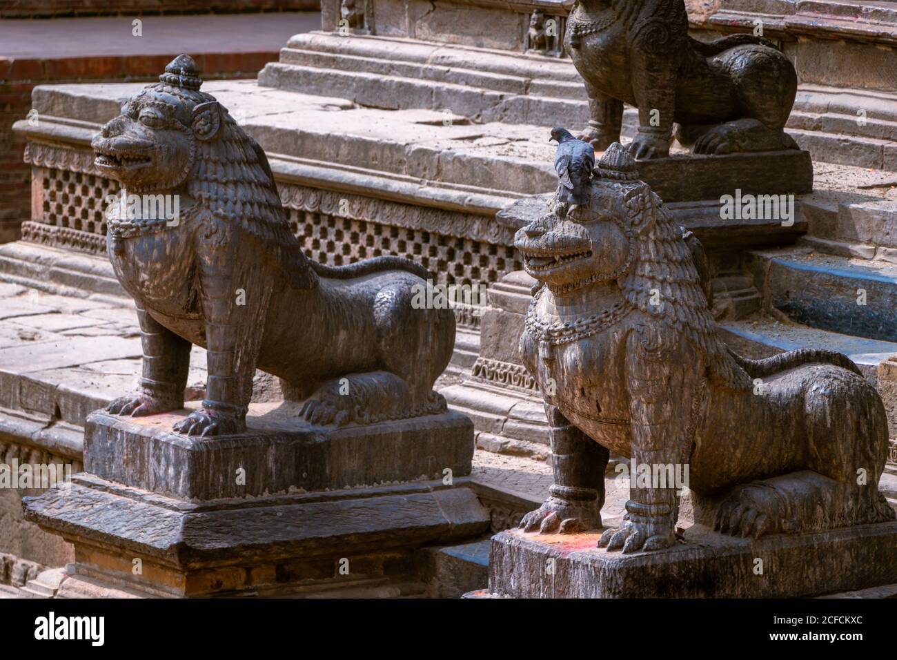 The statue of lion at the entrance of Krishna Mandir(Krishna Template ...