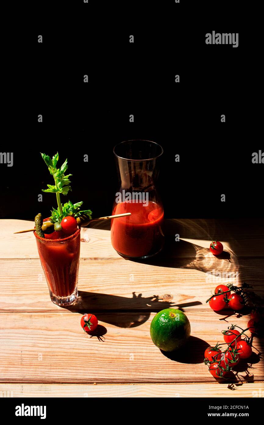 Virgin blood mary placed on a wooden table with black background Stock ...