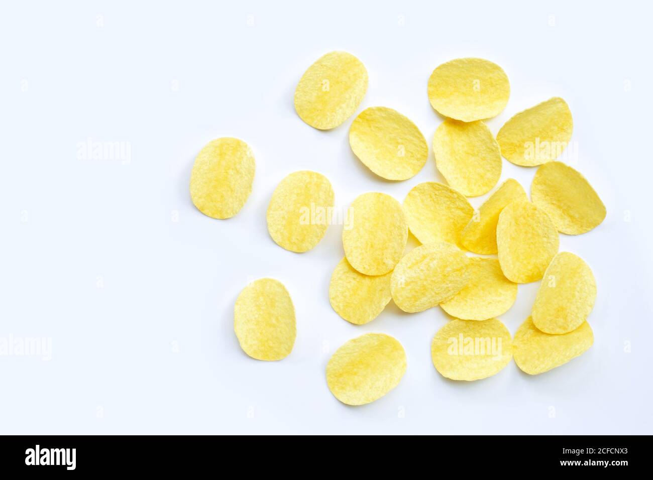 Potato chips on white background. Top view Stock Photo - Alamy