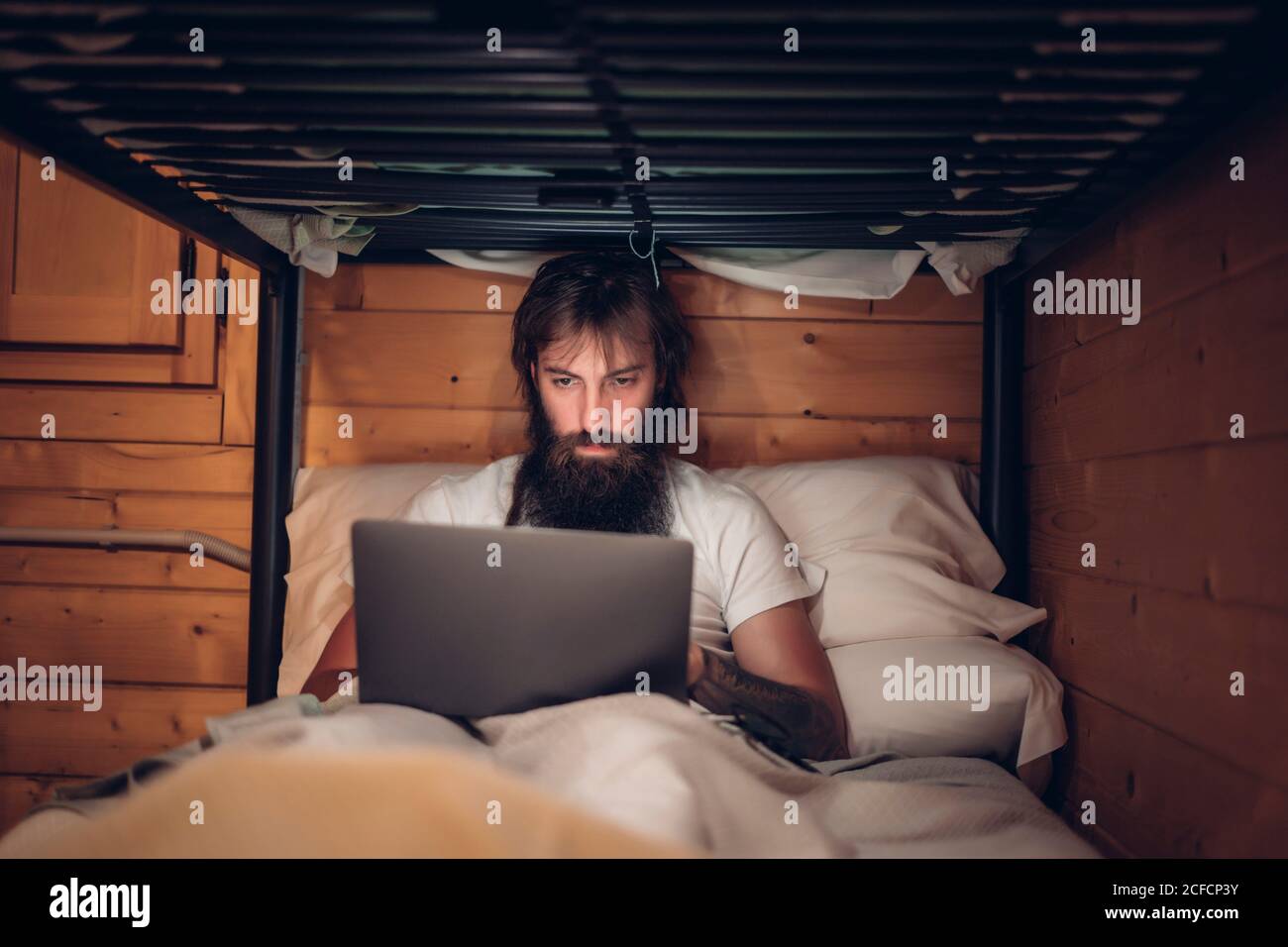 Bunk bed man hi-res stock photography and images - Alamy