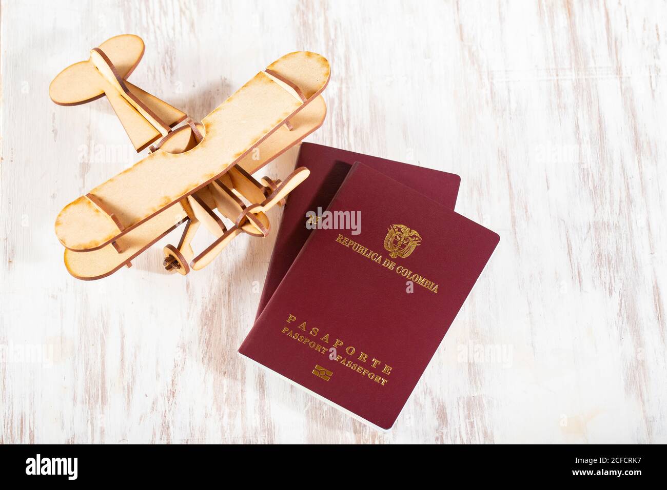 Colombian passport on wooden background close-up image Stock Photo - Alamy