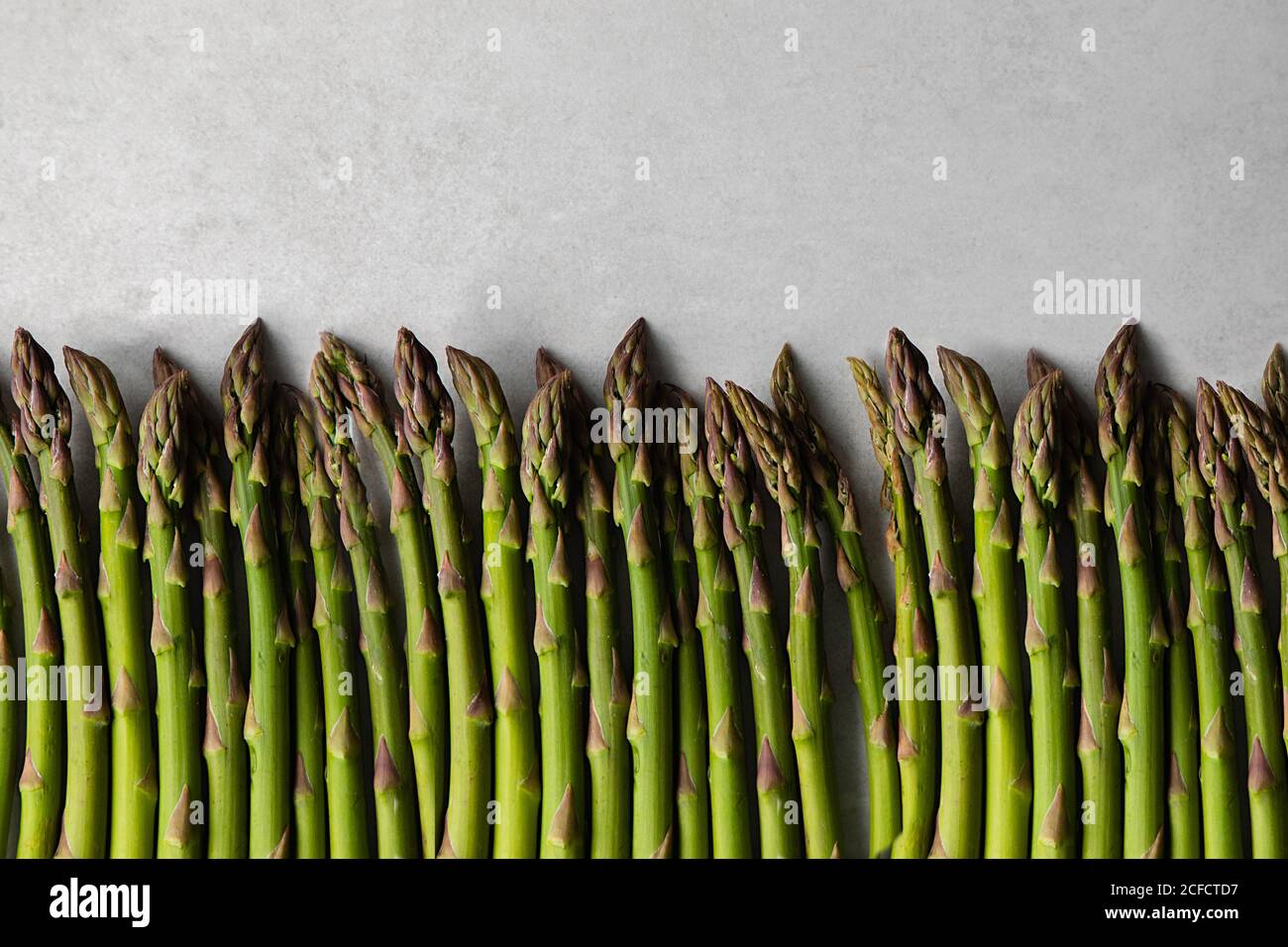 Fresh asparagus on marble table Stock Photo - Alamy