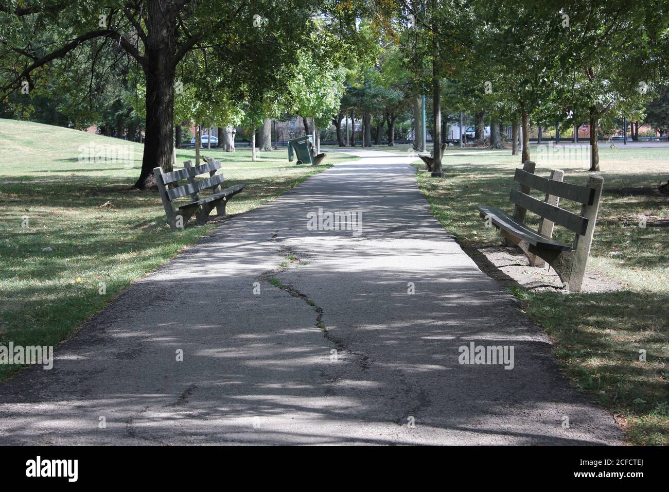 A walking path winding thru local meadow Stock Photo - Alamy