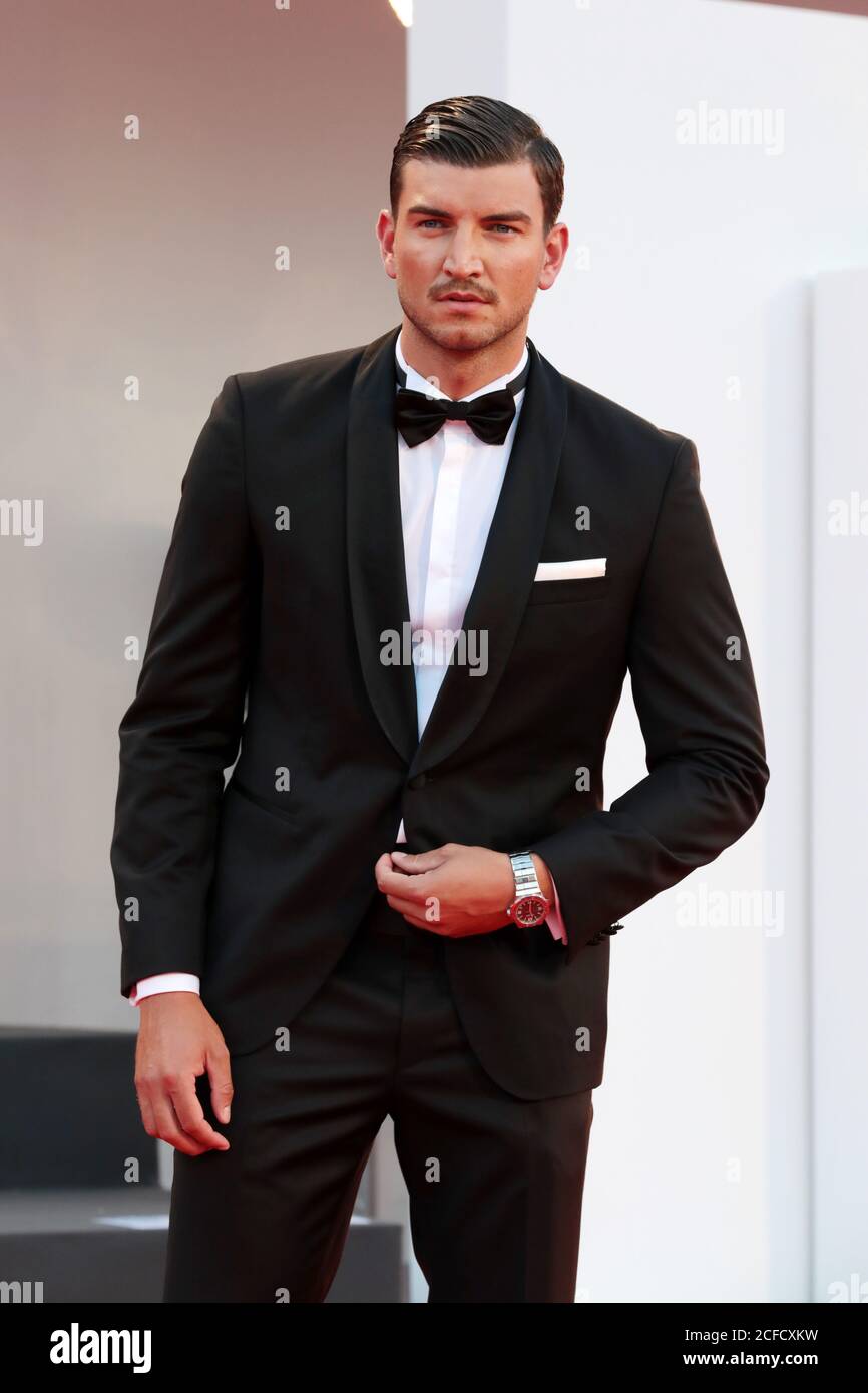 Venice, Italy. 04th Sep, 2020. Marco Fantini walks the red carpet ahead ...