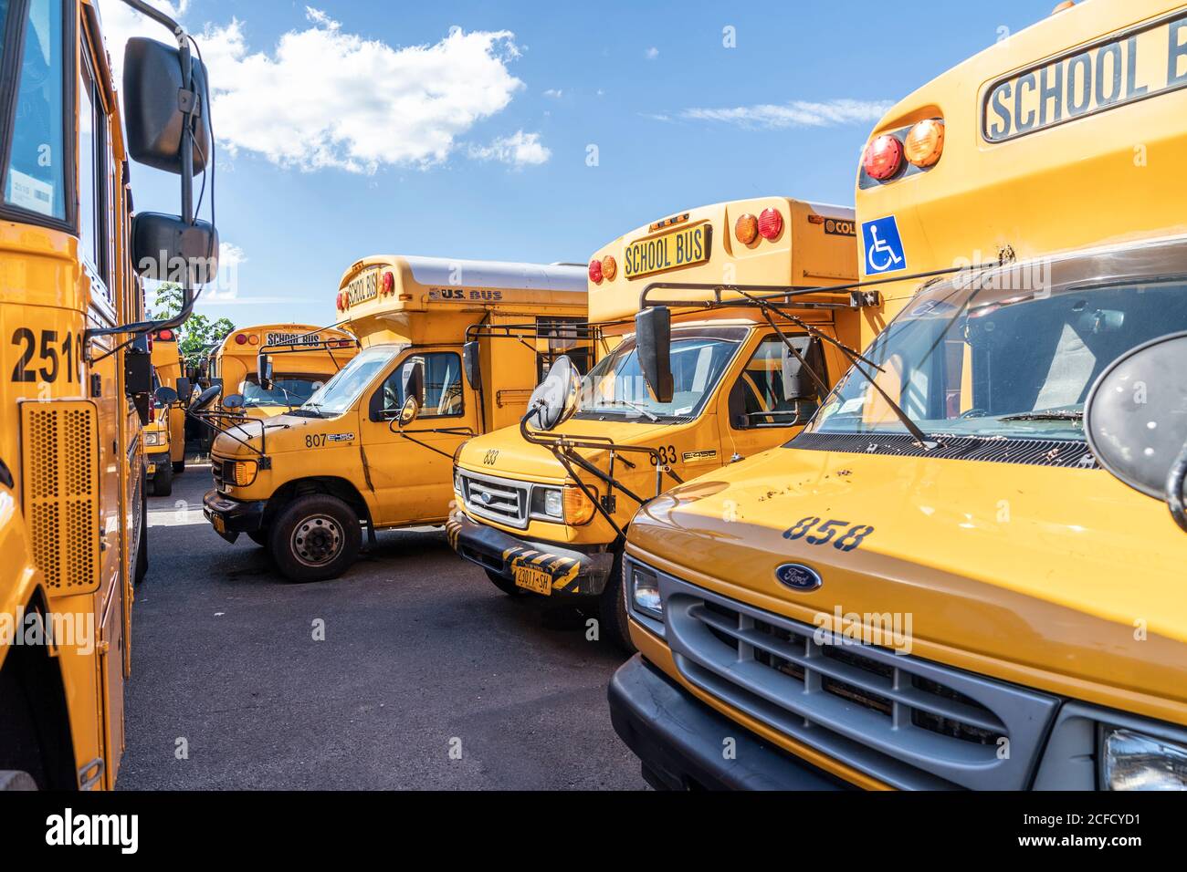 New York, NY - September 4, 2020: View of idle school busses on parking ...