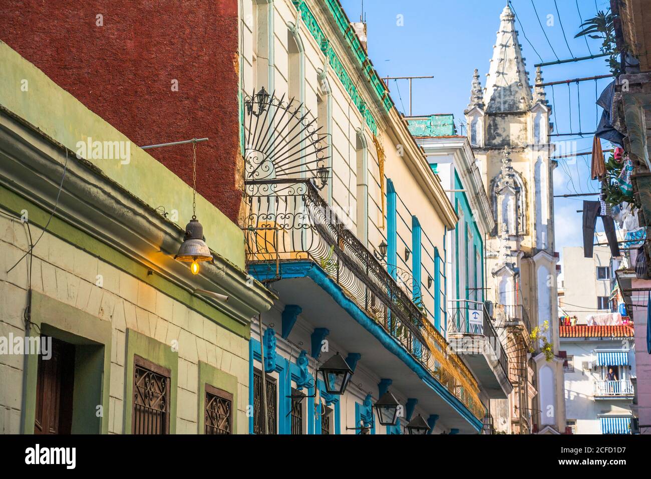 Colorful Cuban alley with colonial house facades, Old Havana, Cuba ...