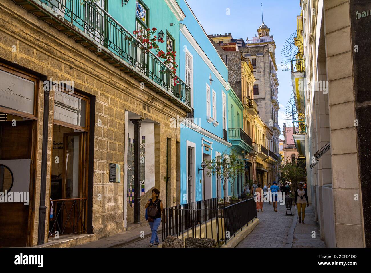Colorful Cuban alley with colonial house facades, Old Havana, Cuba ...