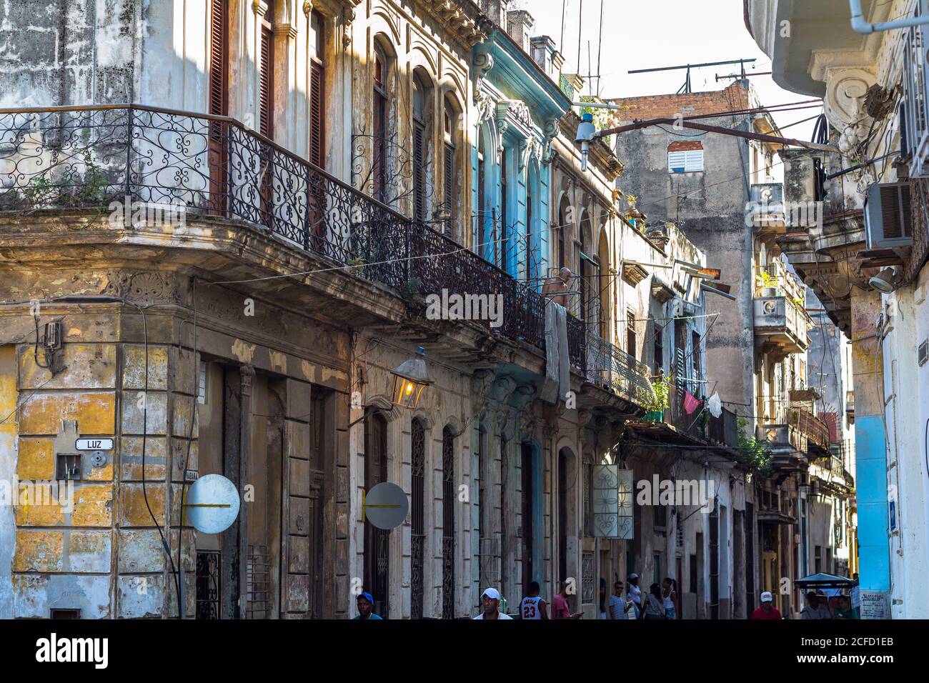 Colorful Cuban alley with old colonial house facades, Old Havana, Cuba ...
