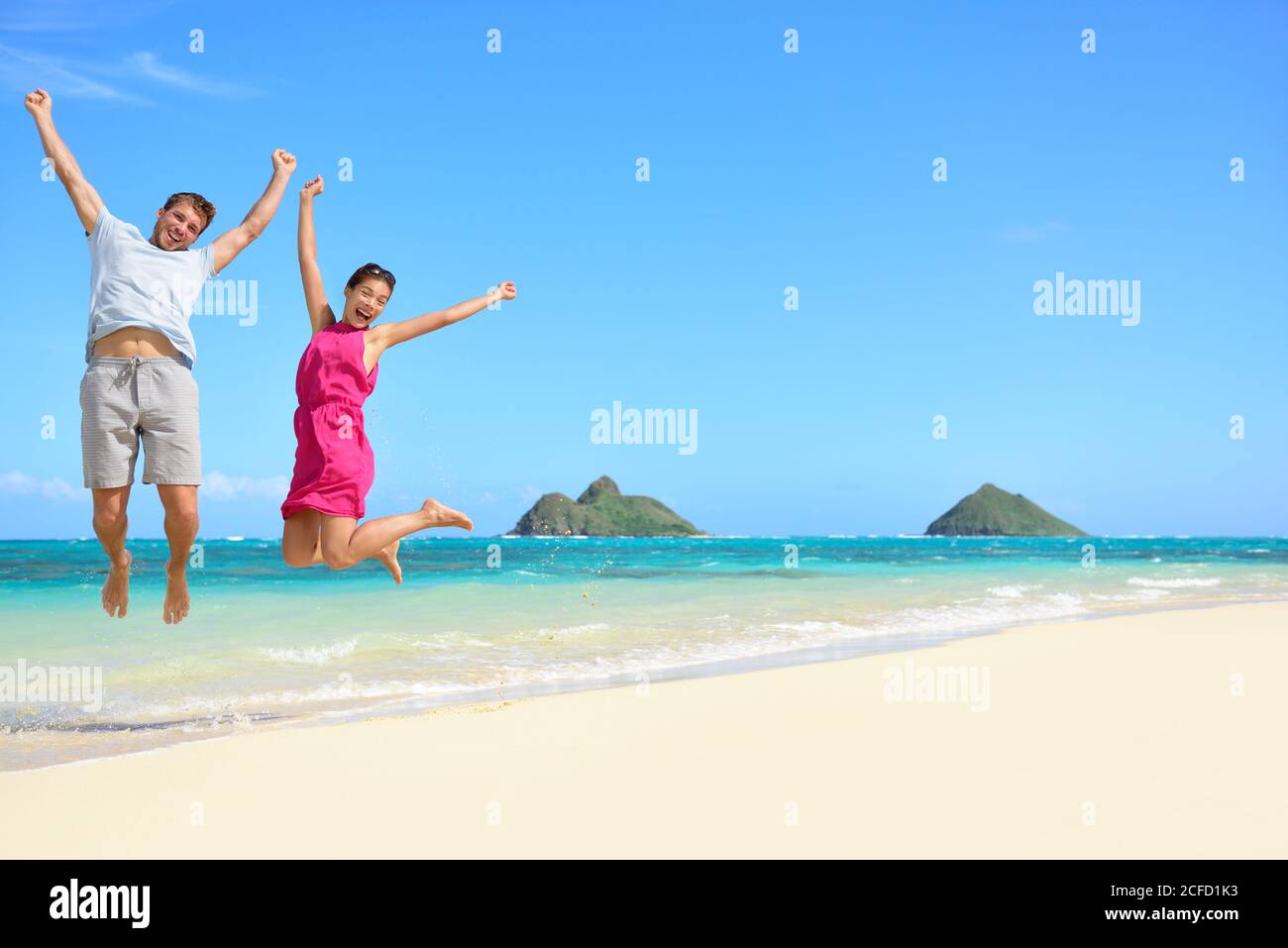 Couples jumping hi-res stock photography and images - Alamy