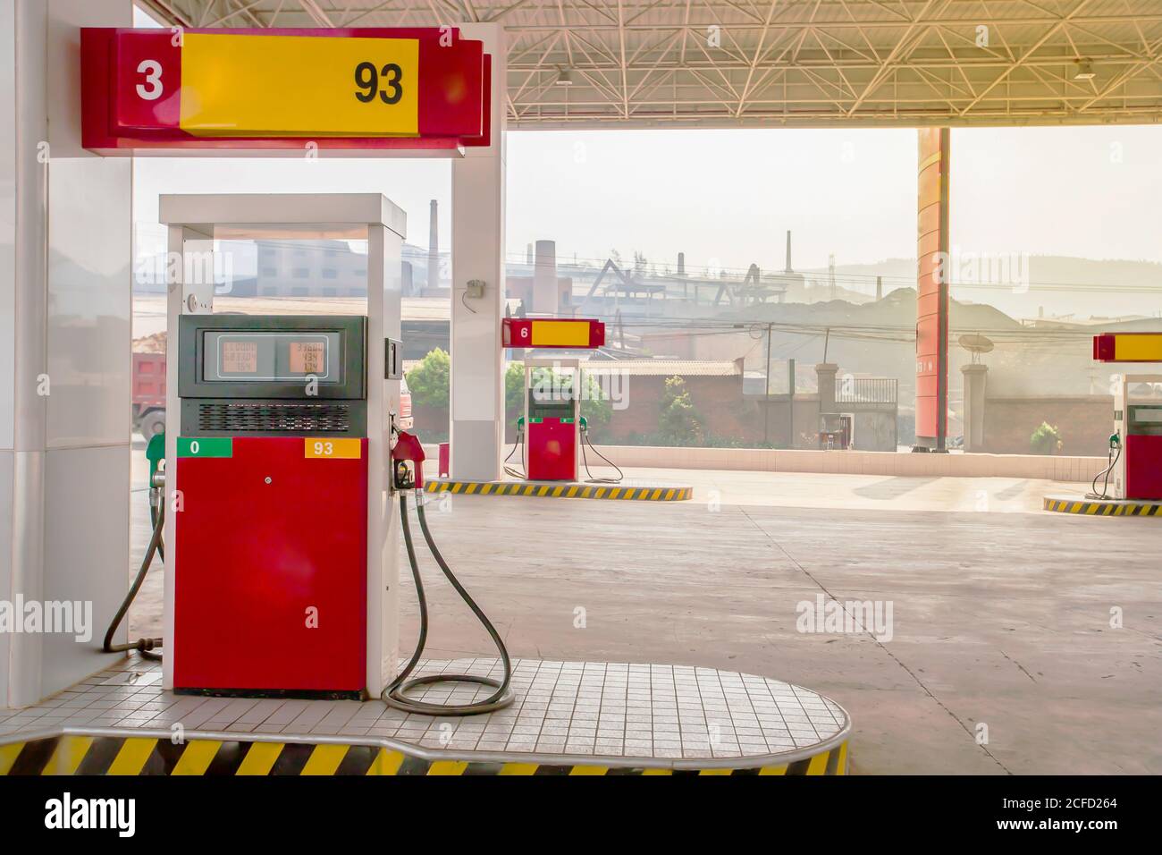 A local gas station and coal mining in the background along the road to ...