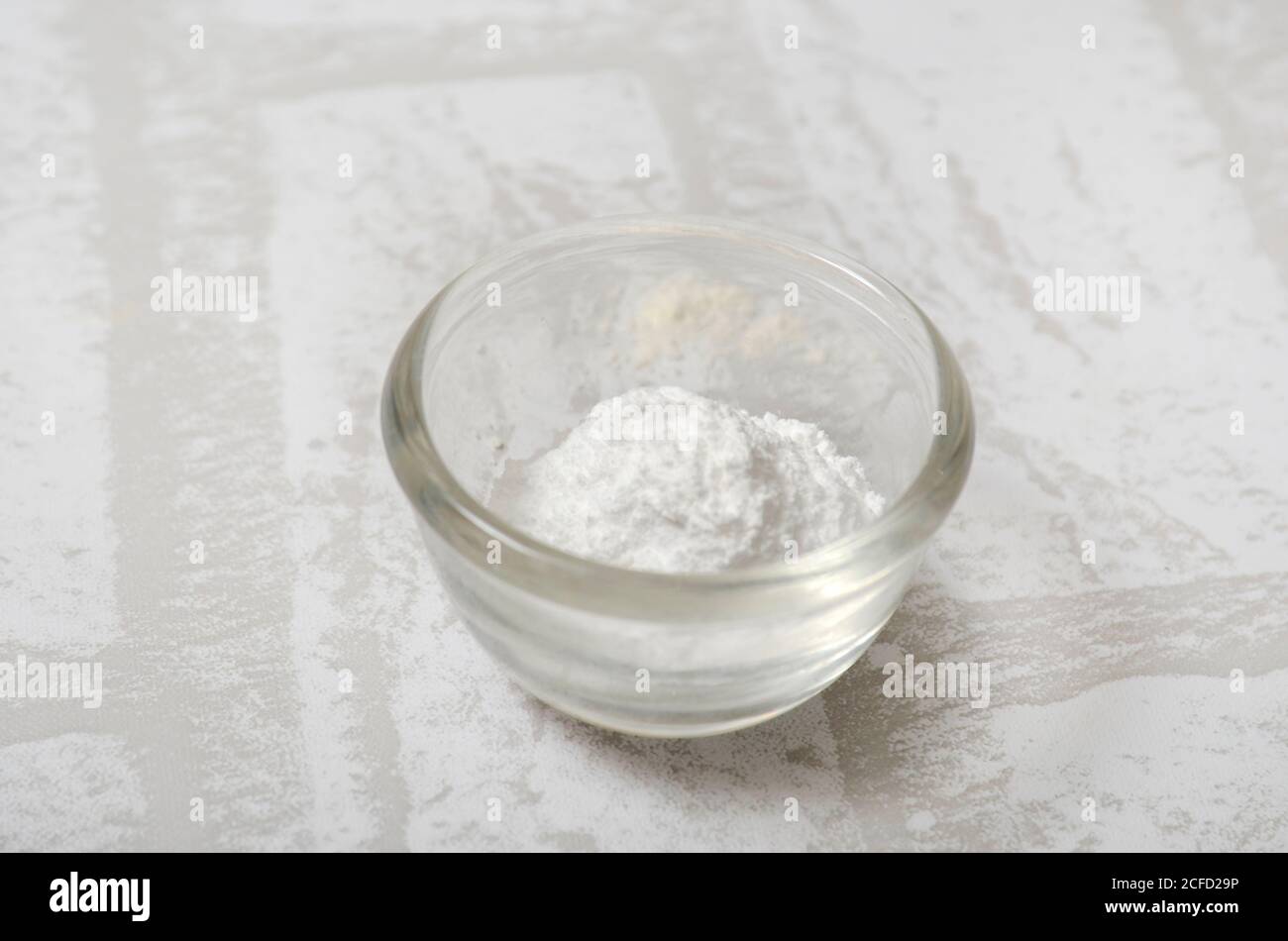 baking powder in a little glass bowl. Ingredient for make a cake Stock ...