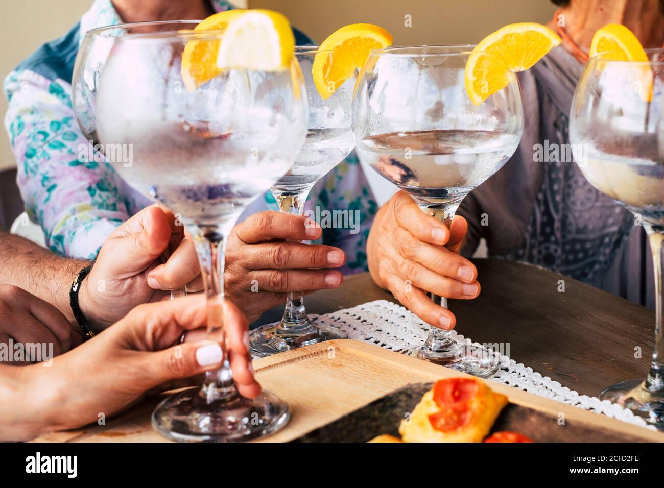 Family outside drinking cocktails hi-res stock photography and images ...
