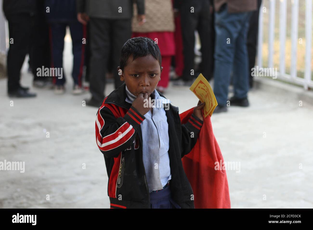 A school kid busy with his fingers Stock Photo - Alamy