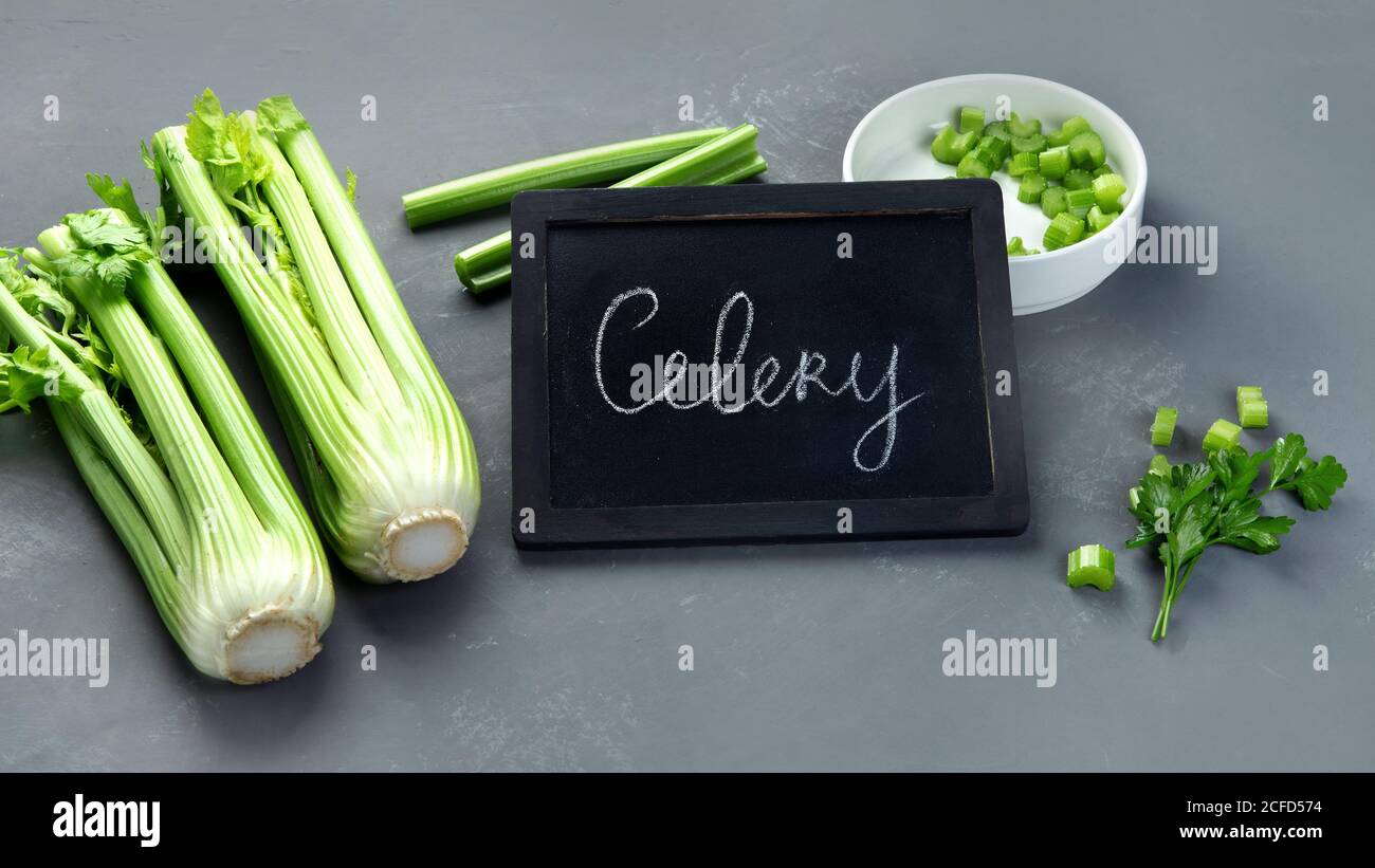 Fresh green organic celery. Celery chopped and celery stalks Stock ...