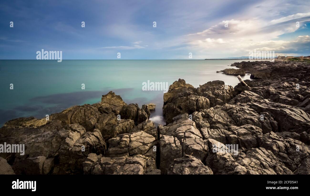 Stone beach at Saint Pierre la Mer in spring Stock Photo - Alamy