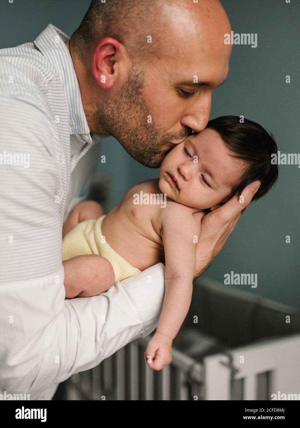 Father hugging cute baby Stock Photo - Alamy
