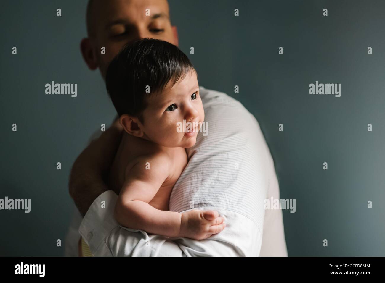 Father hugging cute baby Stock Photo - Alamy
