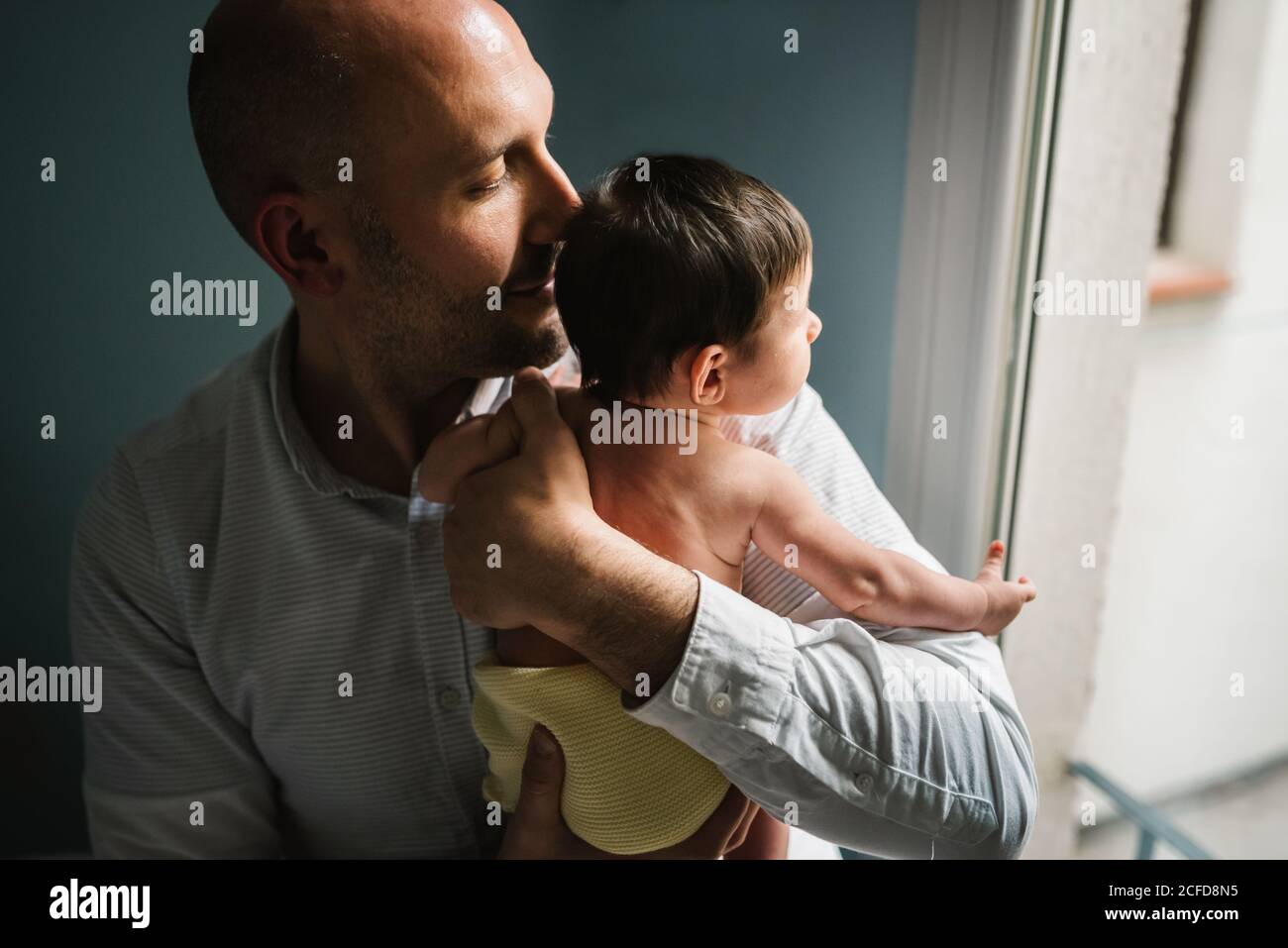 Father hugging cute baby Stock Photo - Alamy