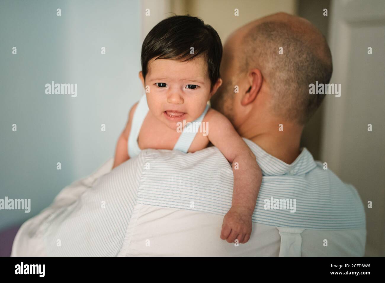 Father hugging cute baby Stock Photo - Alamy