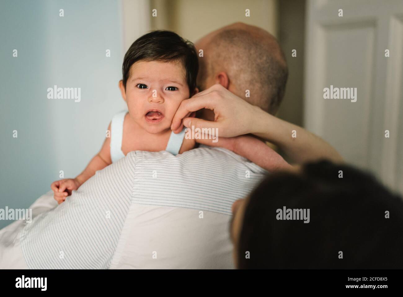 Father hugging cute baby Stock Photo - Alamy