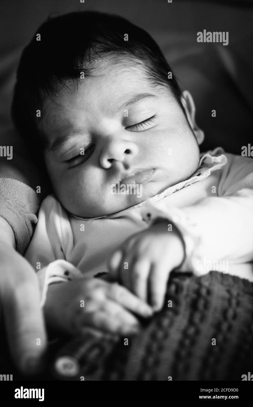 father hugging cute little baby sleeping at home Stock Photo - Alamy