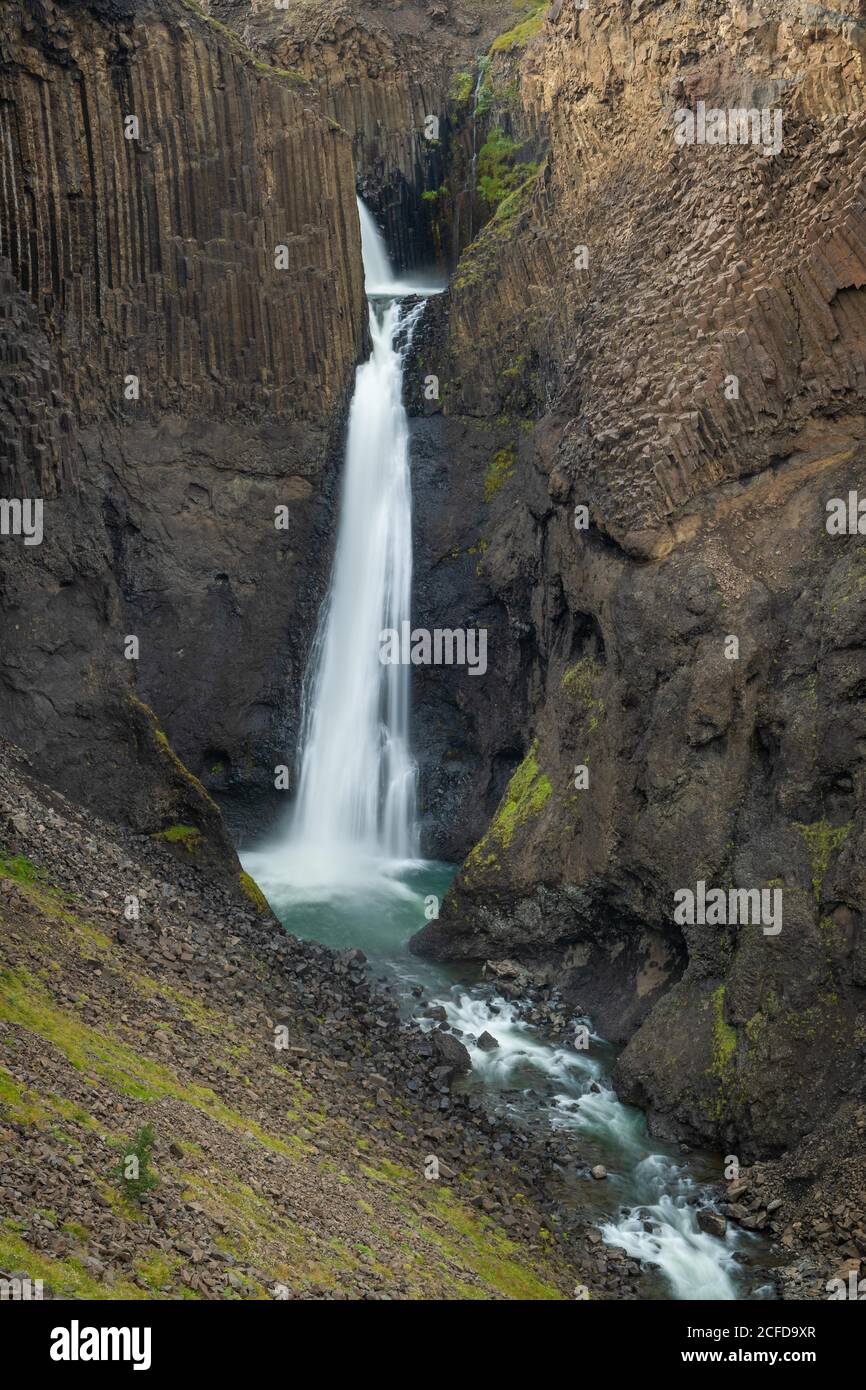 Waterfall Litlanesfoss between columnar basalt, East Iceland, Iceland ...