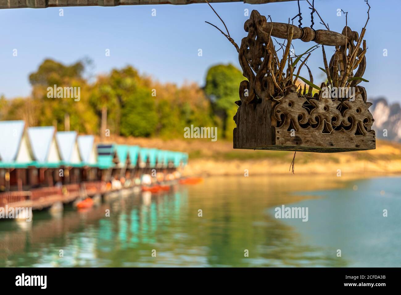 View over footbridge with bungalows (Khao Sok Smiley Lake House) on the ...