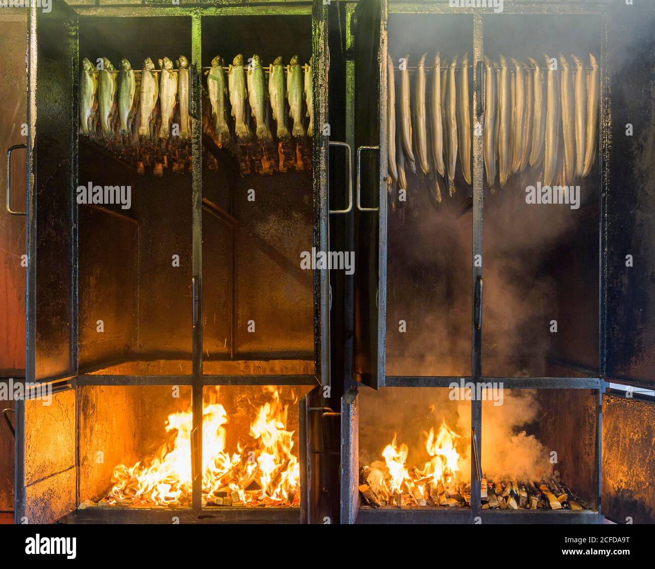Smoked fish smoking hi-res stock photography and images - Alamy