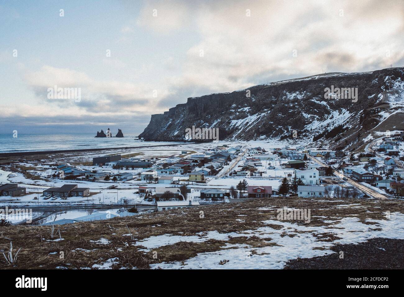 View over the Icelandic town of Vik y Myrdal with troll rocks Stock ...