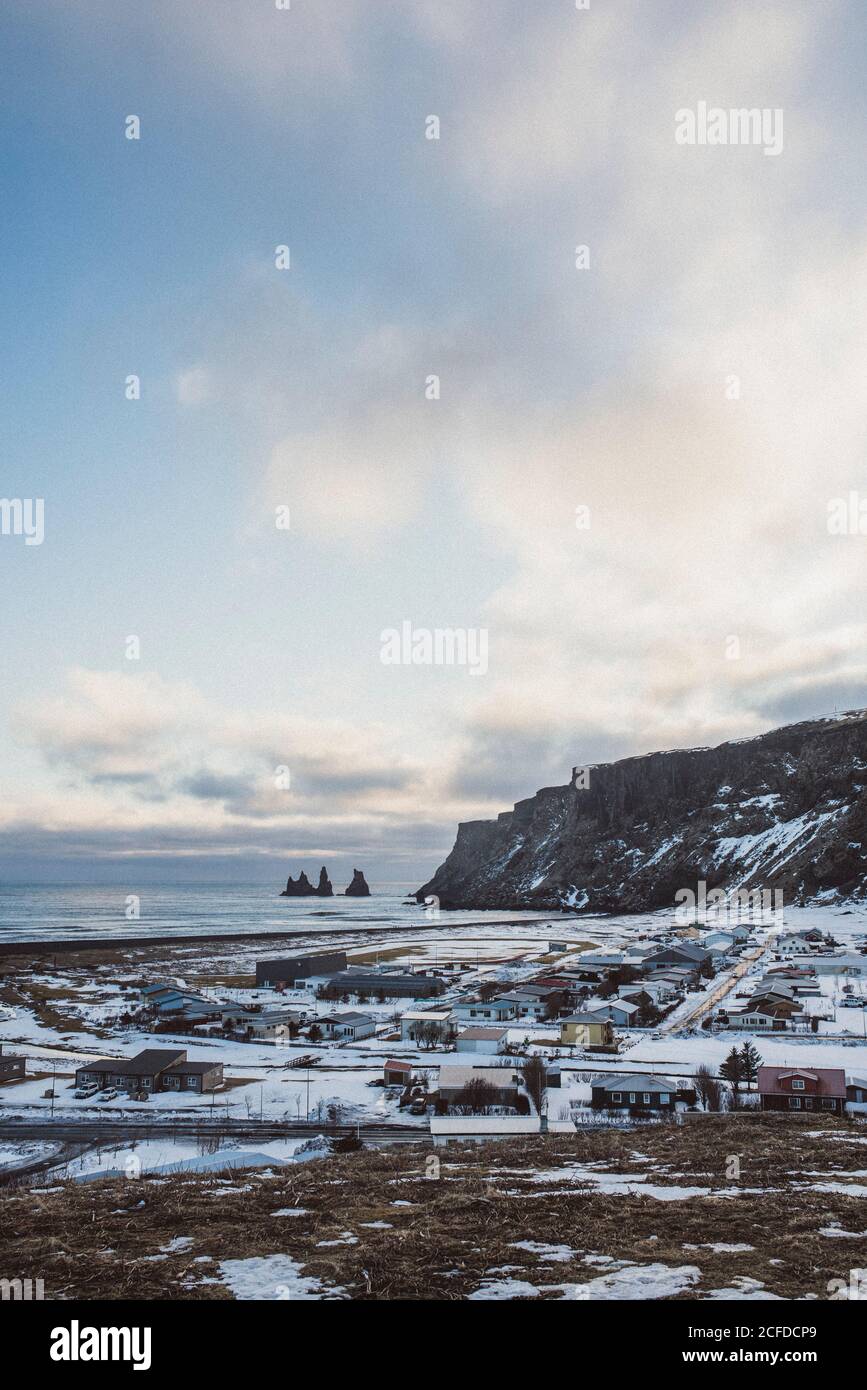 View over the Icelandic town of Vik y Myrdal with troll rocks Stock ...