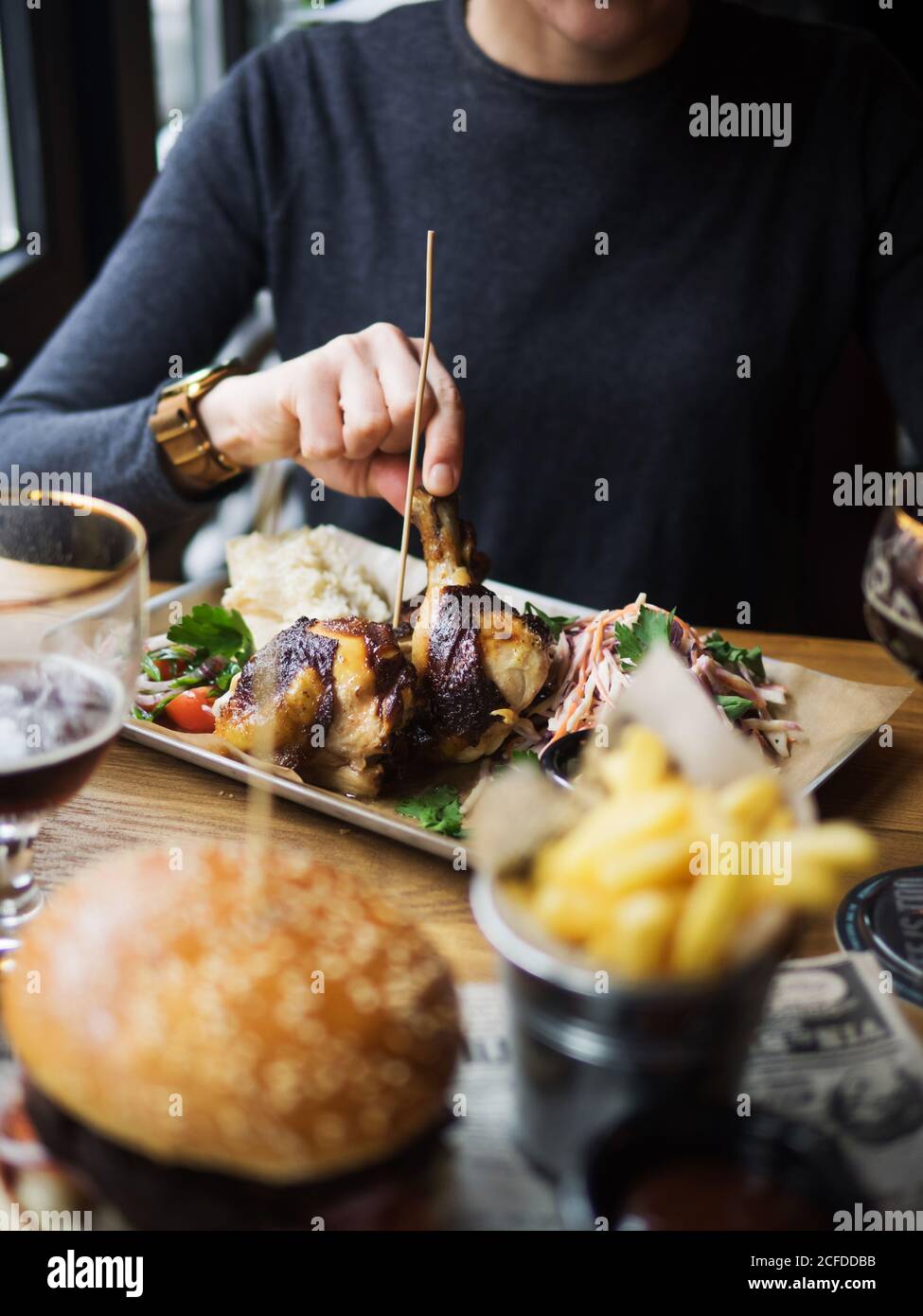 Man eating chicken hi-res stock photography and images - Alamy