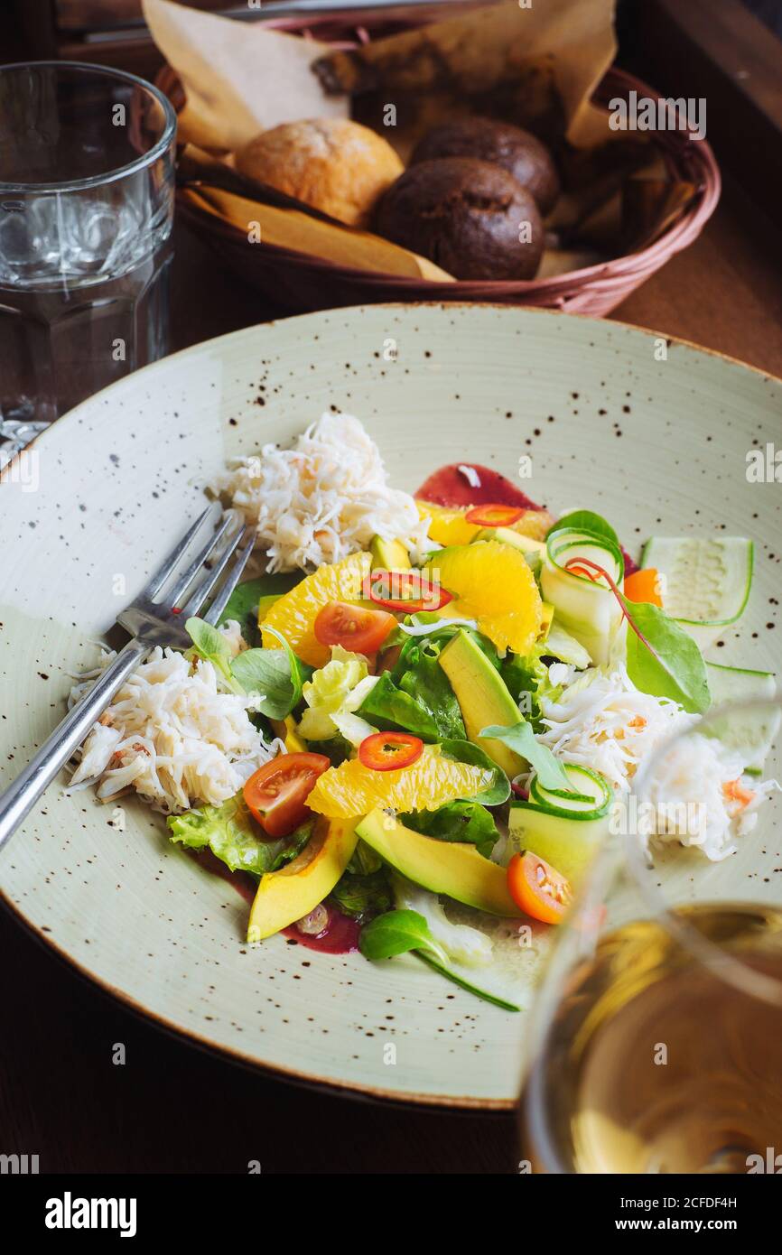 Top view of appetizing healthy colorful salad with fresh vegetables and ...