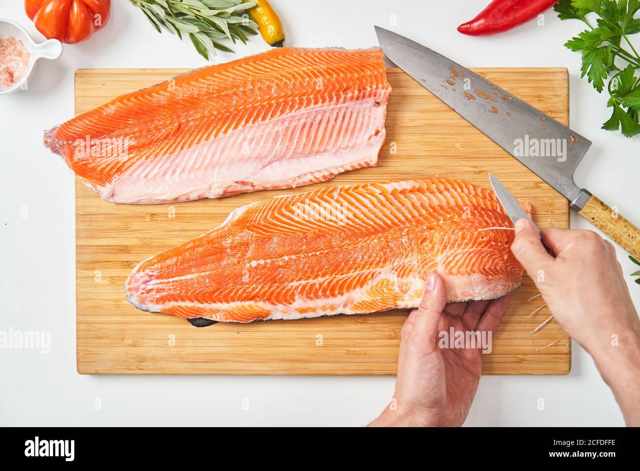 Process of butchering of fresh fish Stock Photo - Alamy