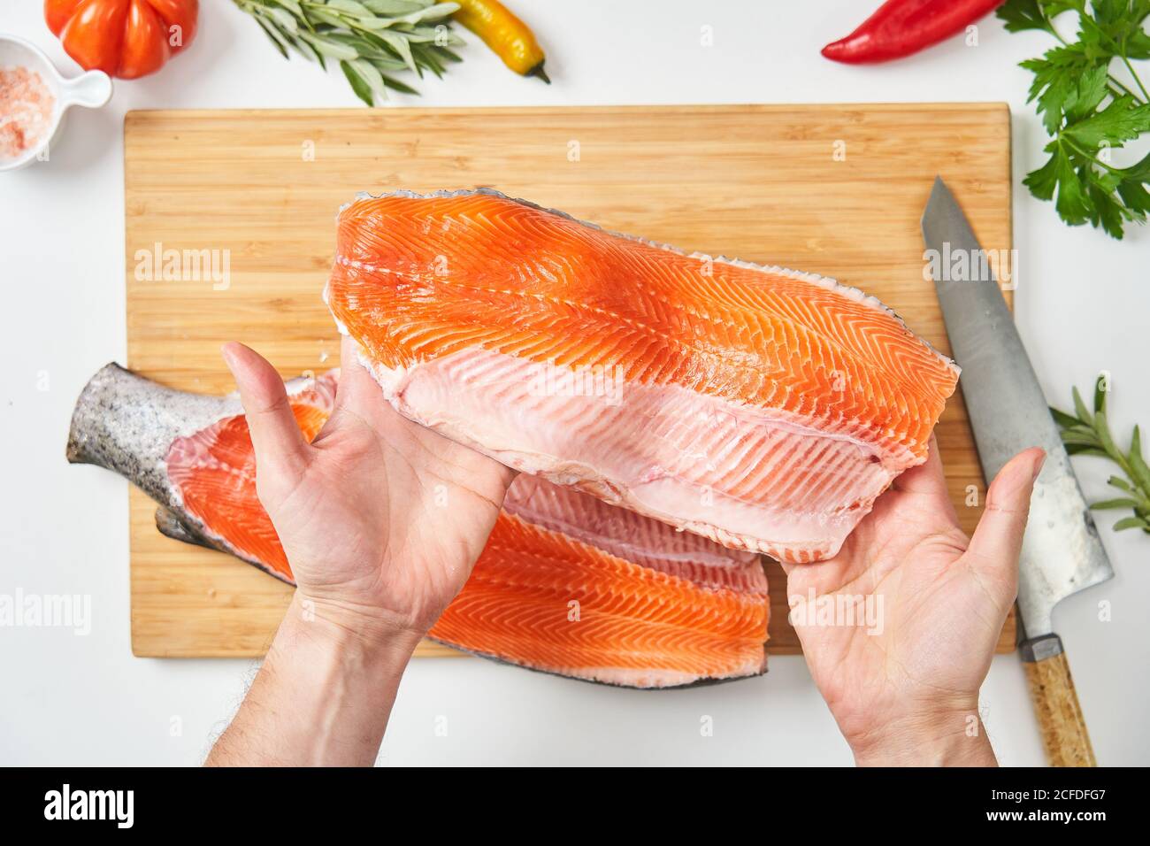 Process of butchering of fresh fish Stock Photo - Alamy