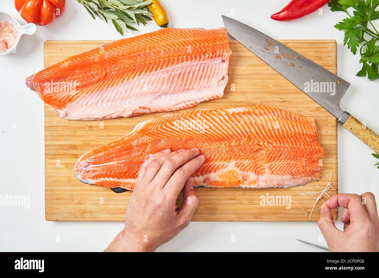 Process of butchering of fresh fish Stock Photo - Alamy