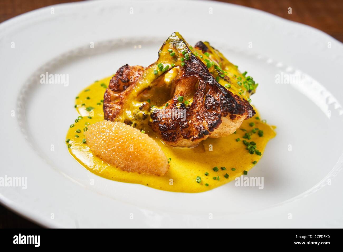 Stylish served high cuisine dish with meat Stock Photo - Alamy
