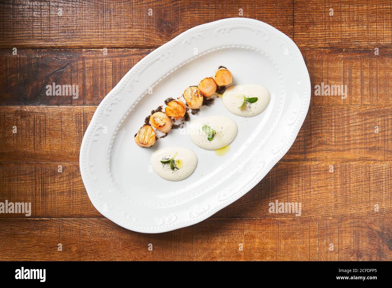Scallops restaurant hi-res stock photography and images - Alamy