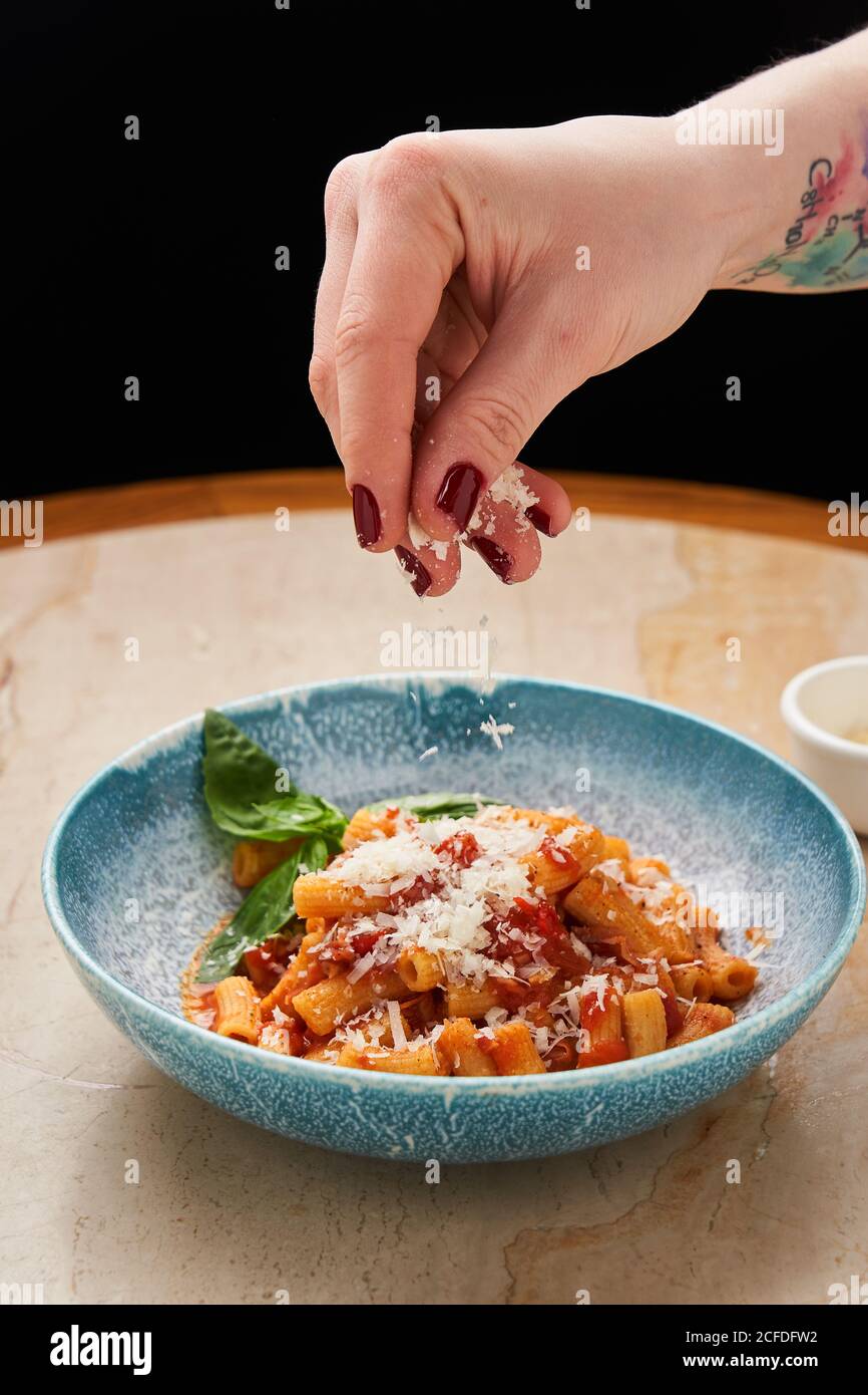 Sprinkling cheese hi-res stock photography and images - Alamy