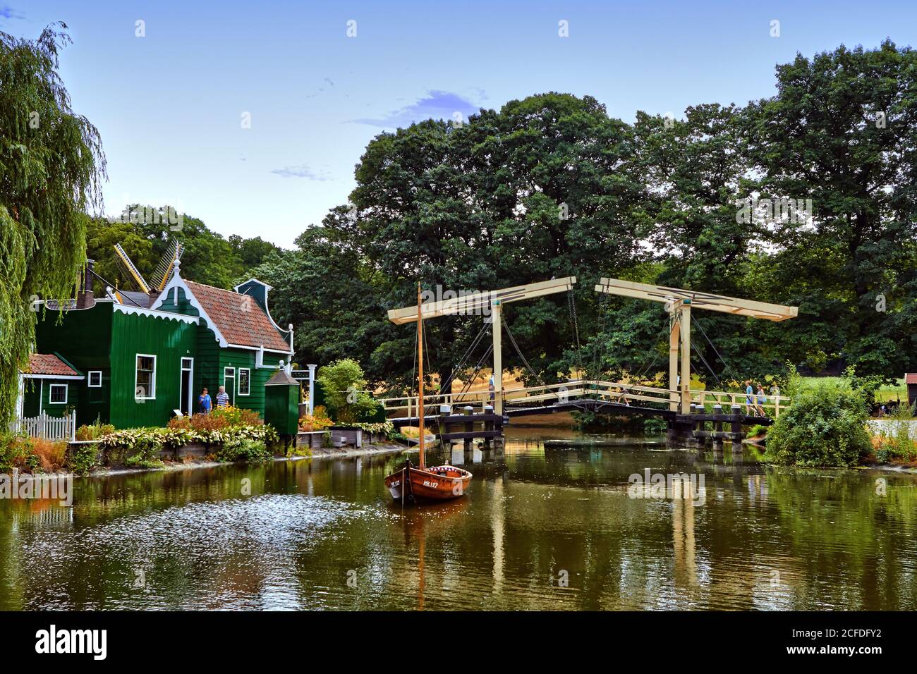 Wind mills close to a lake at Arnhem. Netherlands July 2018 Stock Photo ...