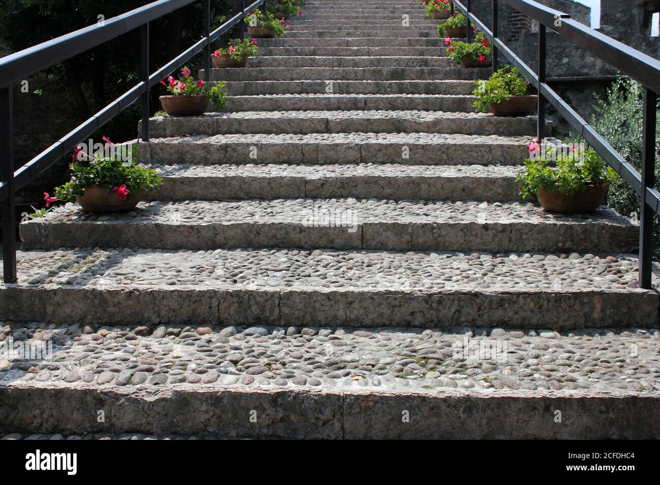 Staircase with a texture of small stones Stock Photo - Alamy