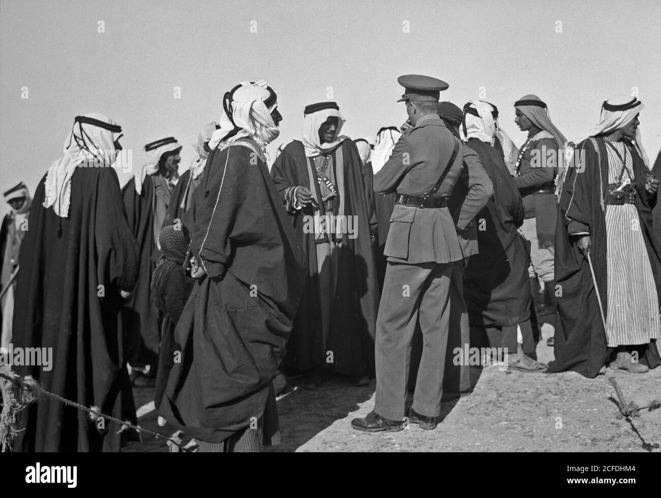 Original Caption: A tribal lunch at cavalry post at Tel-el-Meleiha 20 ...