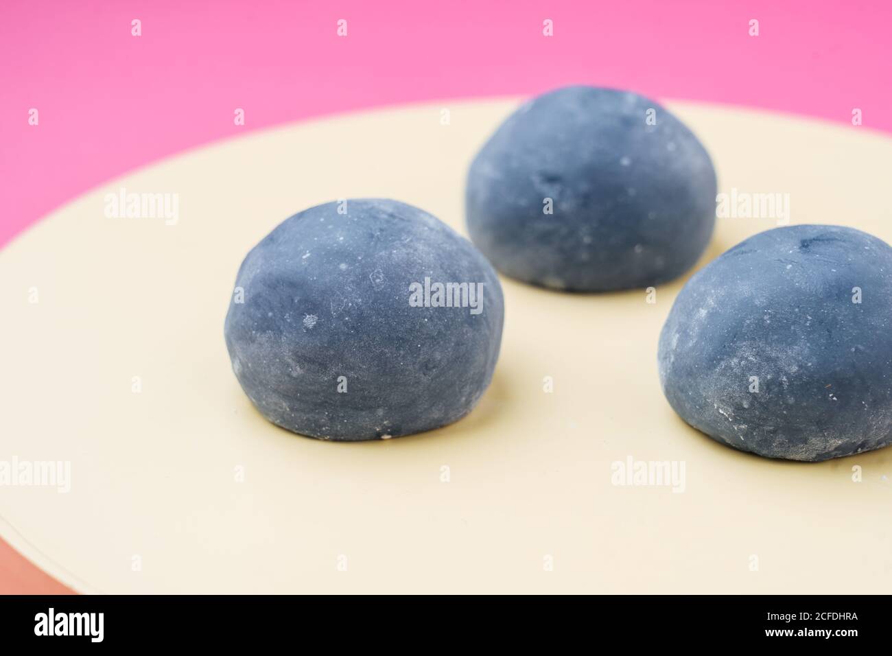 Delicious dessert with grey icing Stock Photo - Alamy