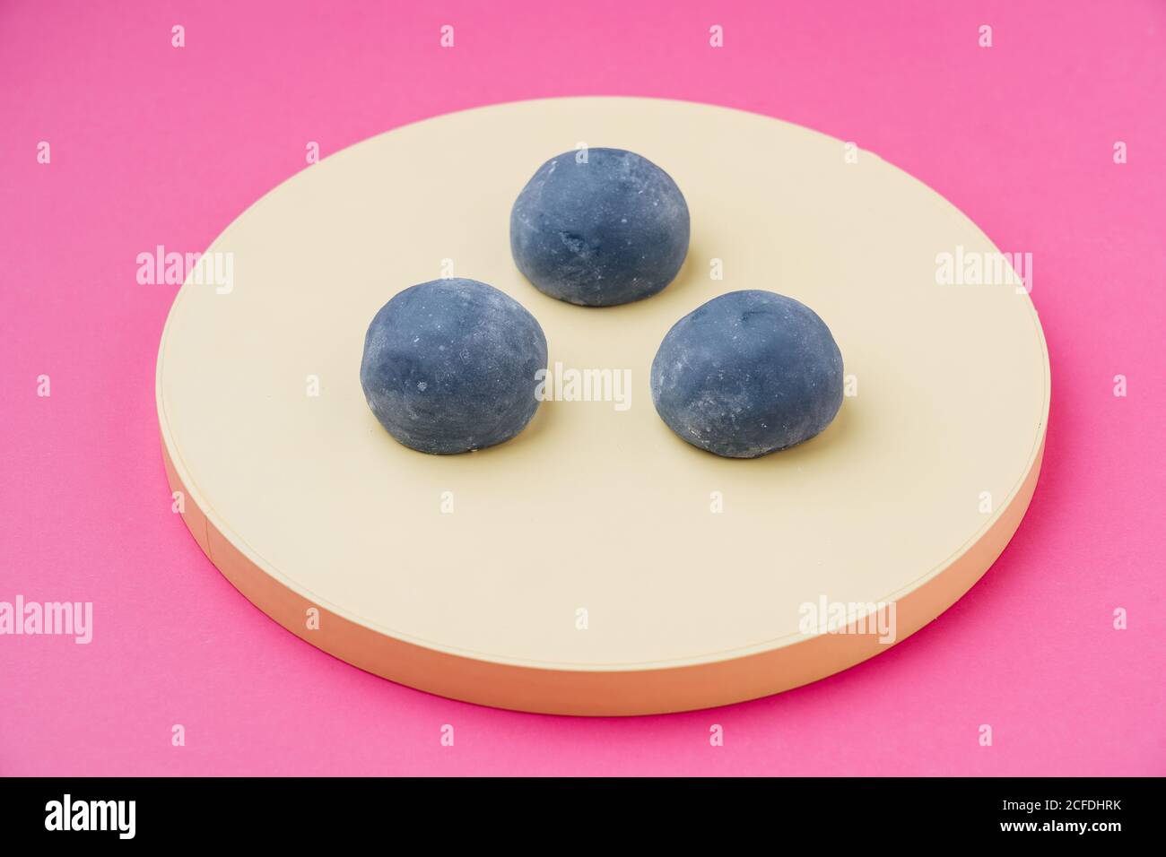 Delicious dessert with grey icing Stock Photo - Alamy