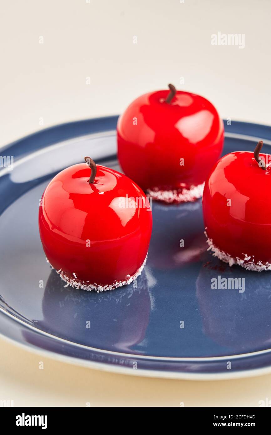 Apple shaped dessert on plate Stock Photo - Alamy