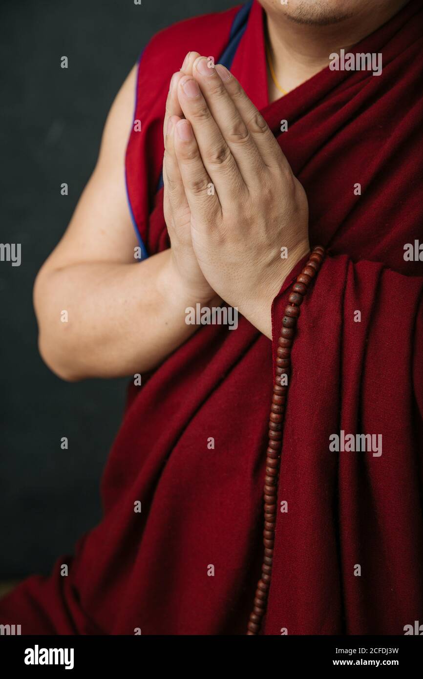 Monk with folded hands hi-res stock photography and images - Alamy