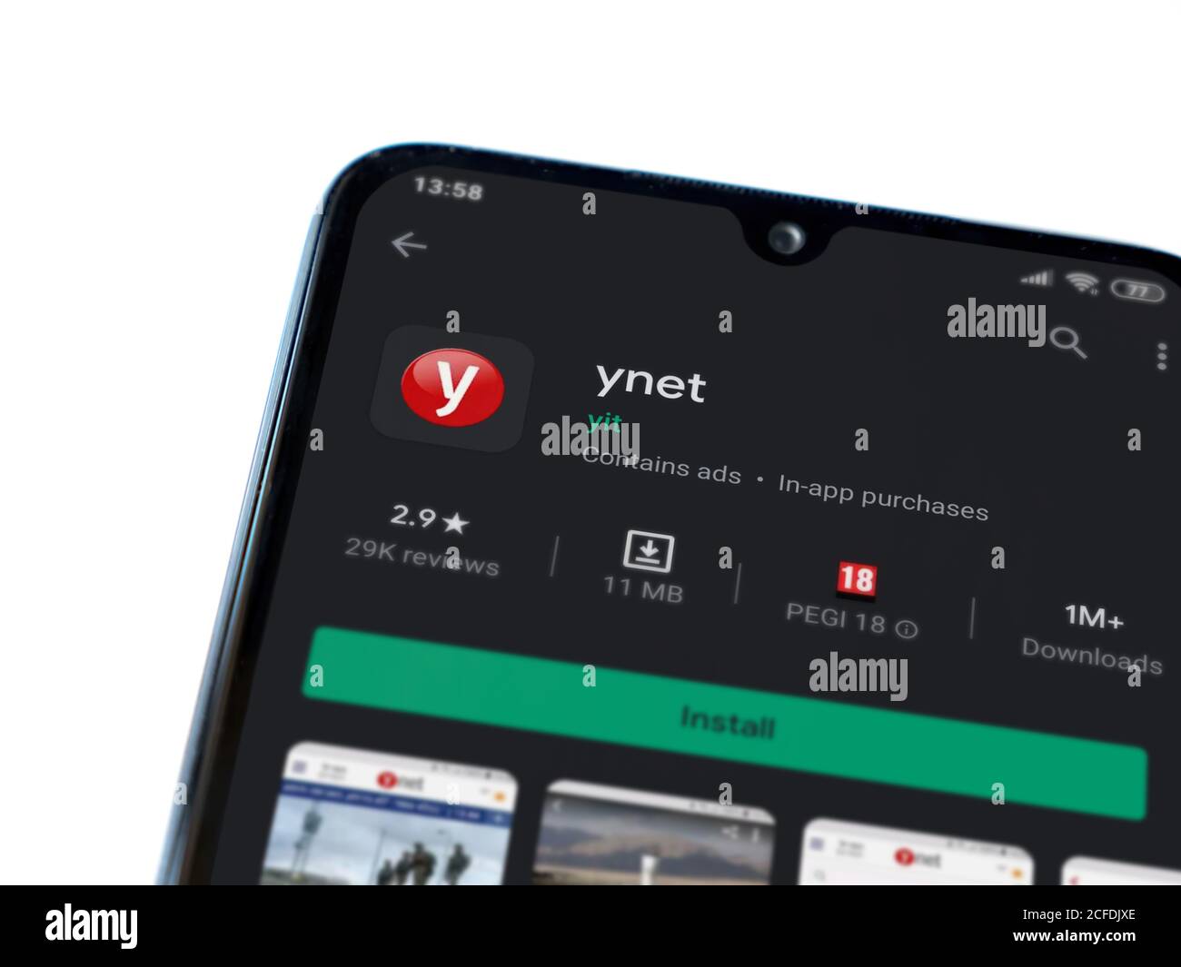 Lod, Israel - July 8, 2020: ynet app play store page on the display of a black mobile smartphone ...