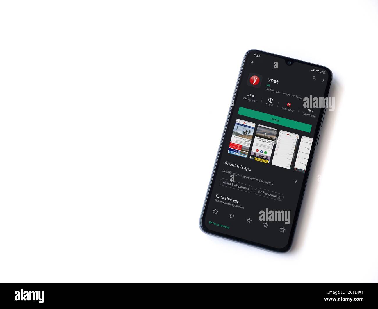 Lod, Israel - July 8, 2020: ynet app play store page on the display of a black mobile smartphone ...