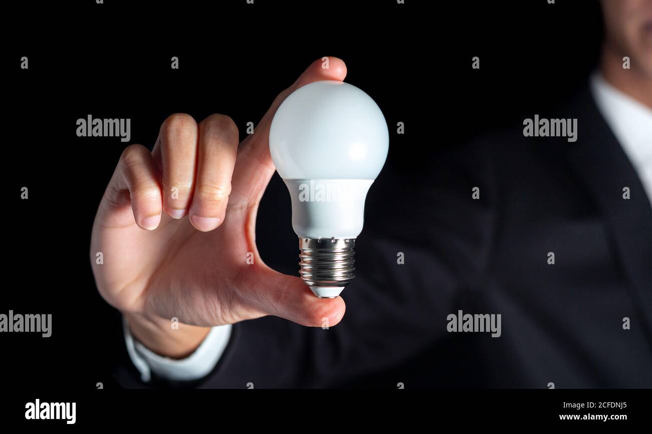 Person thinking lightbulb hi-res stock photography and images - Alamy