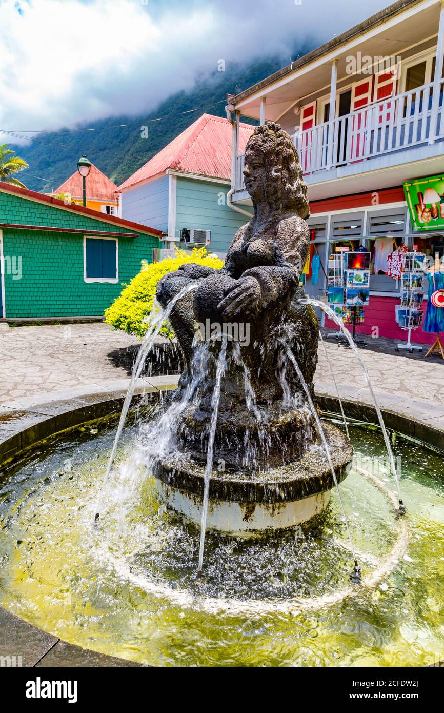 Heva, basalt statue by Gilbert Clain, in 2000, Hell-Bourg, one of the ...